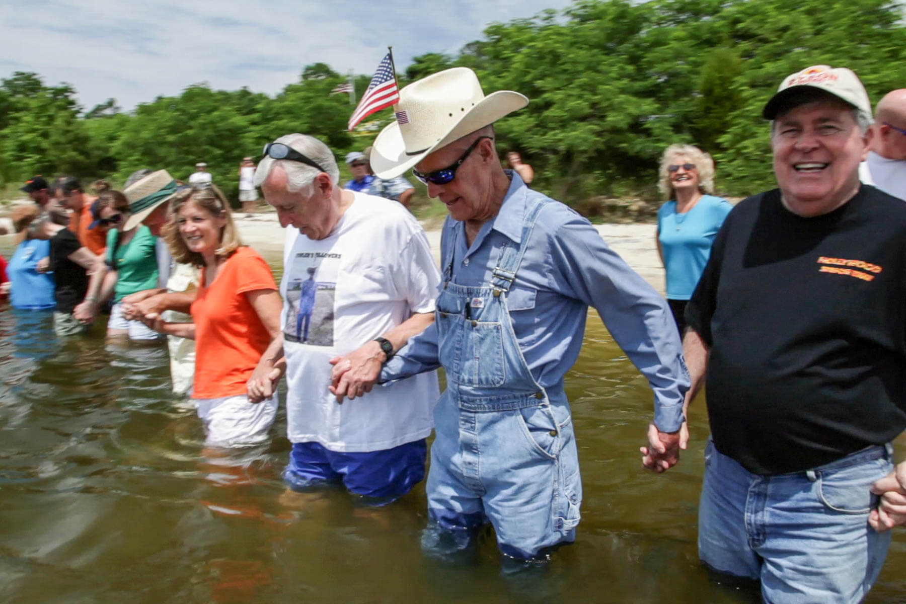 Bernie Fowler measures a sneaker index of 34 inches at annual wade-in